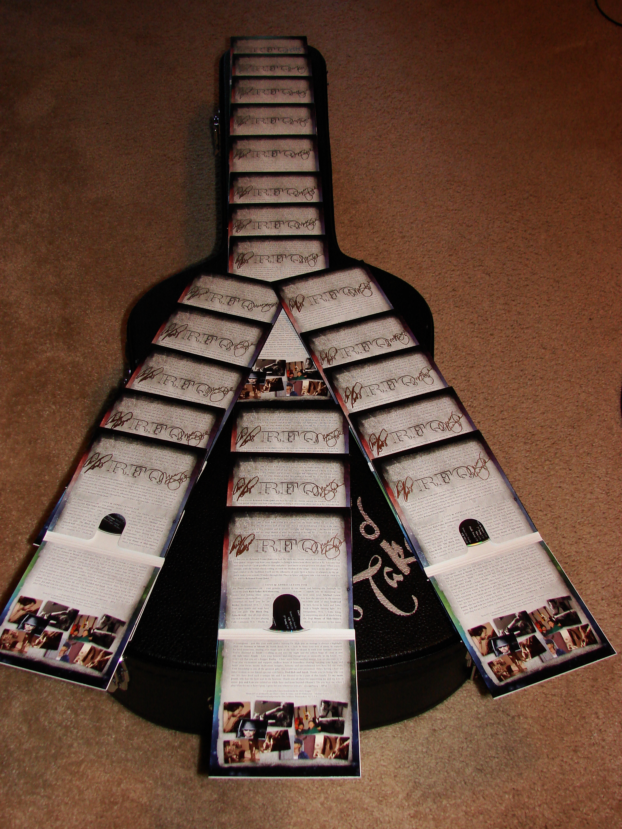 Signing our CDs for you :)