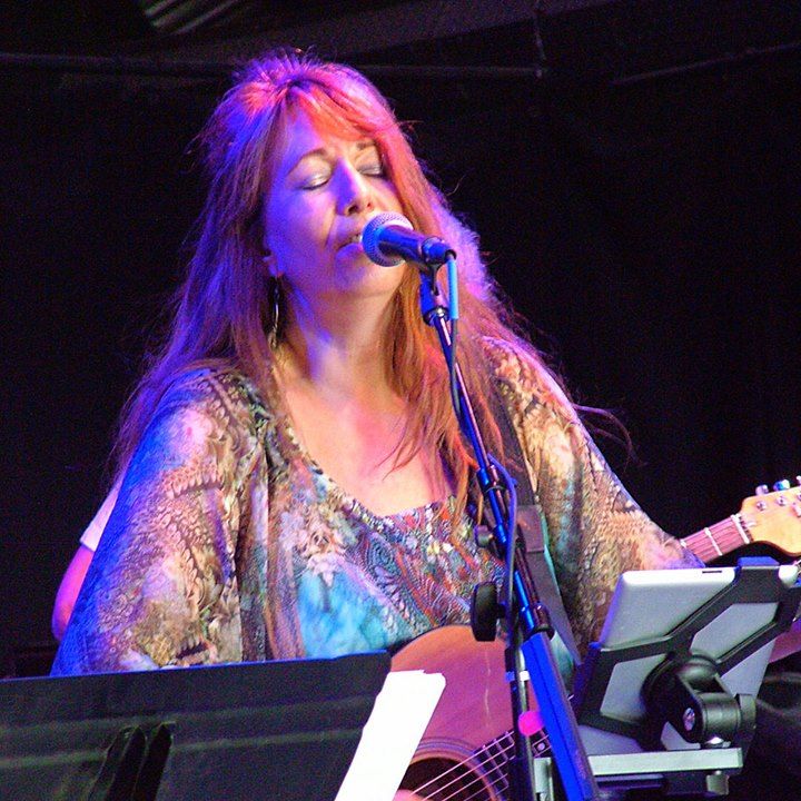 Laura Melanie Collins - Singer/Songwriter/Musician/Composer - Bio