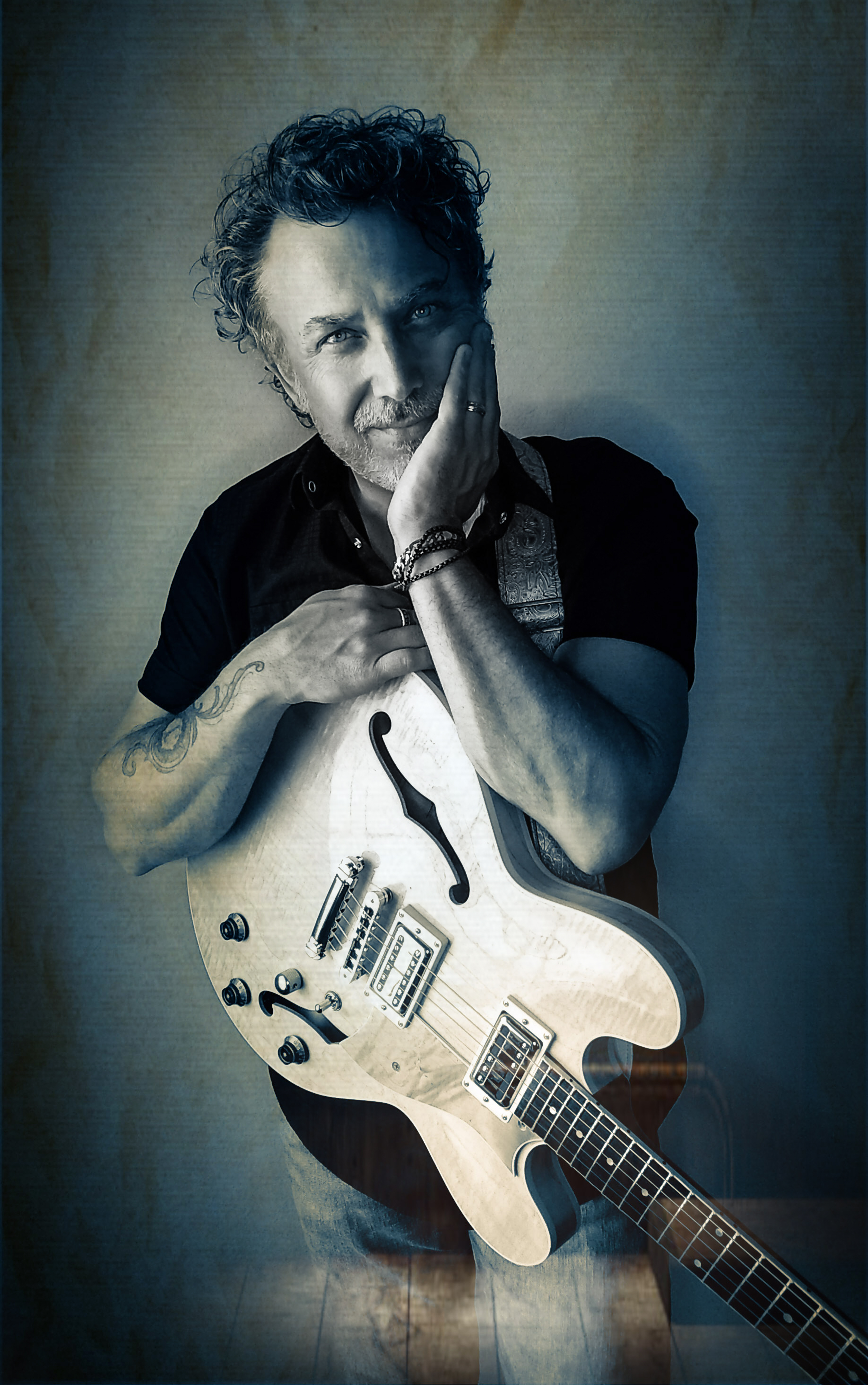 Woody Russell | guitar-centric singer-songwriter with an unapologetic ...